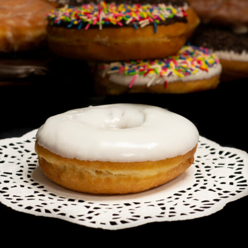 Iced Raised Ring Donuts with Rainbow Jimmies - Prantl's Bakery