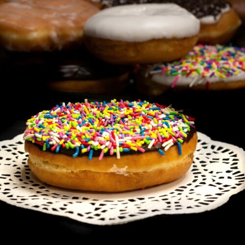 Iced Raised Ring Donuts with Rainbow Jimmies - Prantl's Bakery