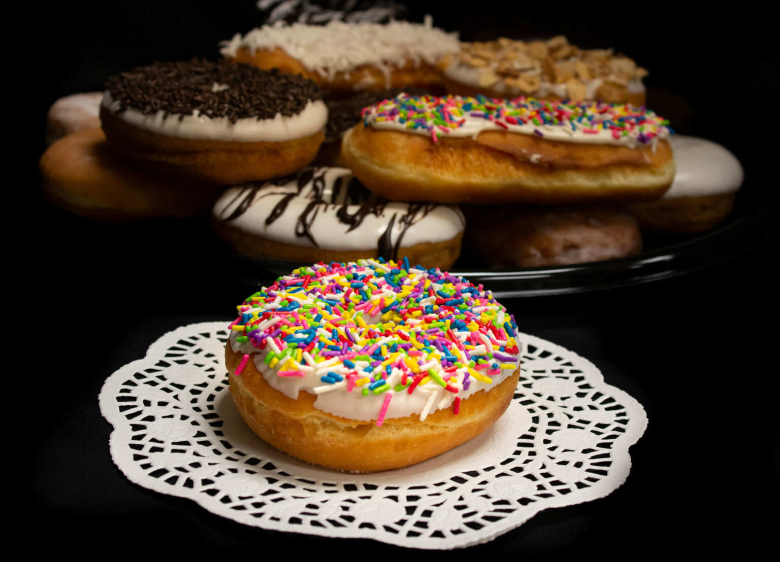 Iced Raised Ring Donuts with Rainbow Jimmies - A Pittsburgh Favorite