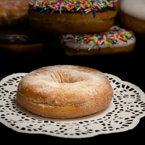 Iced Raised Ring Donuts with Rainbow Jimmies - Prantl's Bakery