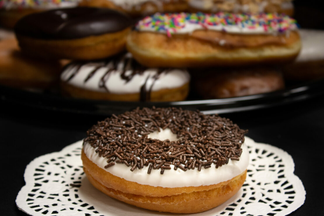 Iced Raised Ring Donuts with Chocolate Jimmies - A Pittsburgh Favorite